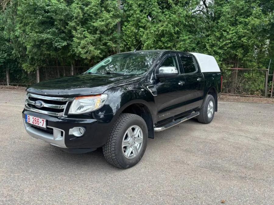 Black Ford Ranger 2014 in Ogre, with an engine capacity of 2.20 L and mileage of 216 thousand km for 11850 €, photo 3 on AUTOMOTO.COM.LV