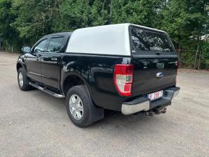 Black Ford Ranger 2014 in Ogre, with an engine capacity of 2.20 L and mileage of 216 thousand km for 11850 €, photo 5 on AUTOMOTO.COM.LV