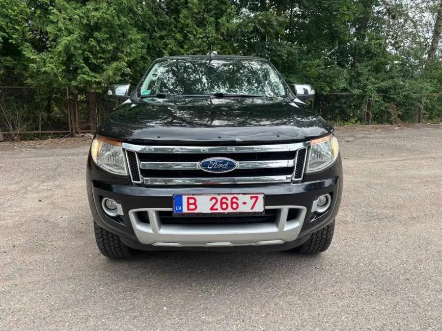 Black Ford Ranger 2014 in Ogre, with an engine capacity of 2.20 L and mileage of 216 thousand km for 11850 €, photo 6 on AUTOMOTO.COM.LV
