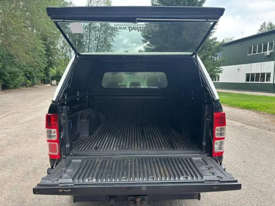 Black Ford Ranger 2014 in Ogre, with an engine capacity of 2.20 L and mileage of 216 thousand km for 11850 €, photo 8 on AUTOMOTO.COM.LV