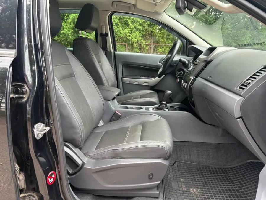 Black Ford Ranger 2014 in Ogre, with an engine capacity of 2.20 L and mileage of 216 thousand km for 11850 €, photo 12 on AUTOMOTO.COM.LV