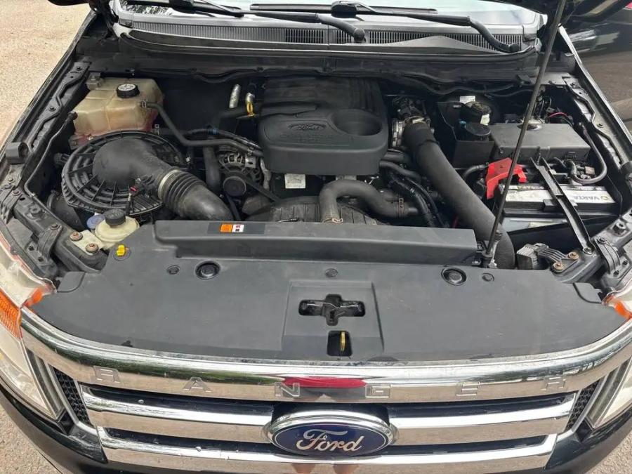 Black Ford Ranger 2014 in Ogre, with an engine capacity of 2.20 L and mileage of 216 thousand km for 11850 €, photo 18 on AUTOMOTO.COM.LV