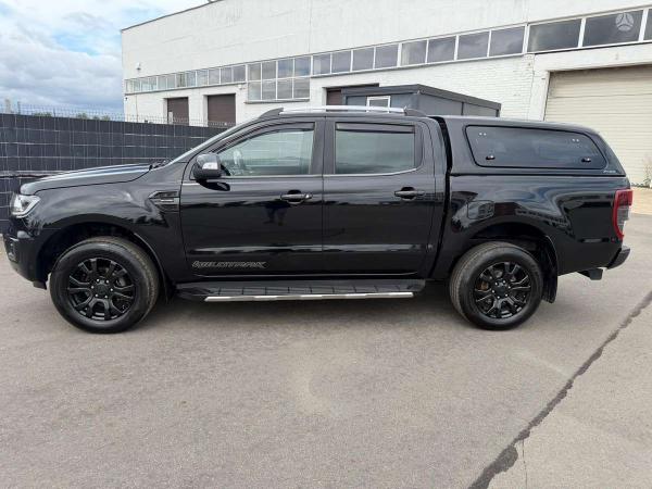 Black Ford Ranger 2023 in Marijampole, with an engine capacity of 2.00 L and mileage of 232 thousand km for 22900 €, photo 3 on AUTOMOTO.COM.LV