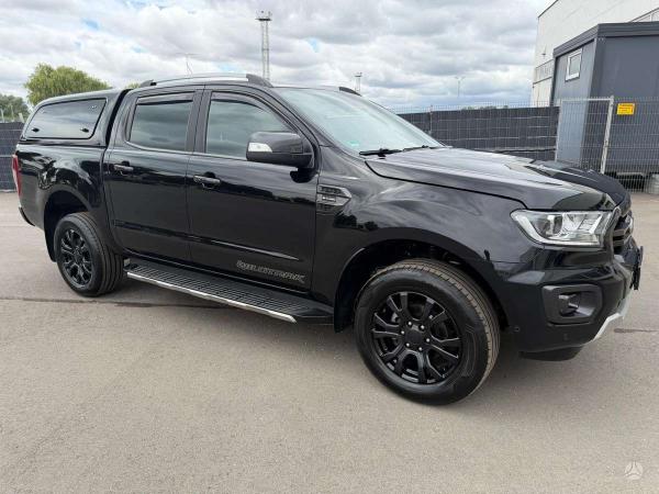 Black Ford Ranger 2023 in Marijampole, with an engine capacity of 2.00 L and mileage of 232 thousand km for 22900 €, photo 4 on AUTOMOTO.COM.LV