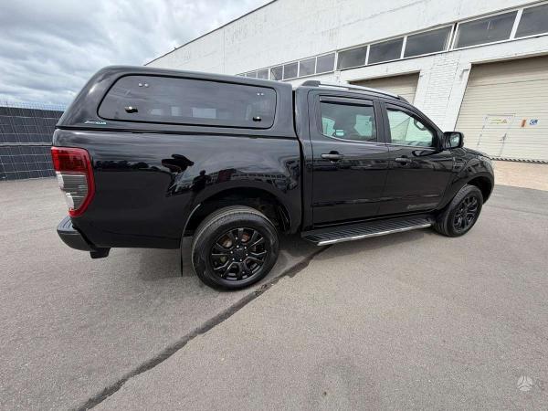 Black Ford Ranger 2023 in Marijampole, with an engine capacity of 2.00 L and mileage of 232 thousand km for 22900 €, photo 6 on AUTOMOTO.COM.LV