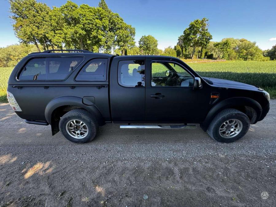 Black Ford Ranger 2009 in Panevezys, with an engine capacity of 2.50 L and mileage of 247 thousand km for 4999 €, photo 5 on AUTOMOTO.COM.LV