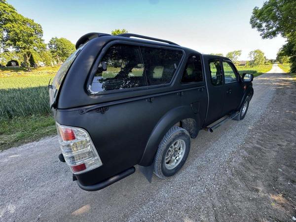 Melns Ford Ranger 2009 Panevēža, ar dzinēja tilpumu 2.50 L un nobraukumu 247 tūkst. km par 4999 €, foto 5 vietnē AUTOMOTO.COM.LV