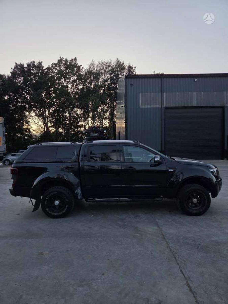 Black Ford Ranger 2014 in Silale, with an engine capacity of 3.20 L and mileage of 117 thousand km for 12300 €, photo 3 on AUTOMOTO.COM.LV