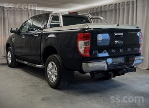 Black Ford Ranger 2015 in Riga, with an engine capacity of 3.20 L and mileage of 280 thousand km for 14990 €, photo 7 on AUTOMOTO.COM.LV