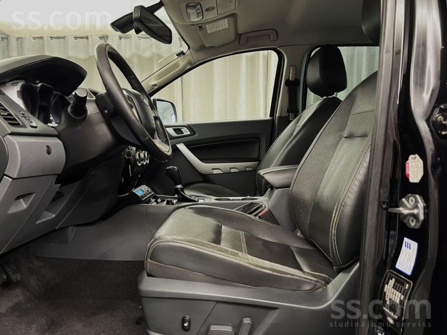 Black Ford Ranger 2015 in Riga, with an engine capacity of 3.20 L and mileage of 280 thousand km for 14990 €, photo 14 on AUTOMOTO.COM.LV
