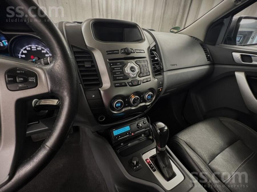 Black Ford Ranger 2015 in Riga, with an engine capacity of 3.20 L and mileage of 280 thousand km for 14990 €, photo 16 on AUTOMOTO.COM.LV
