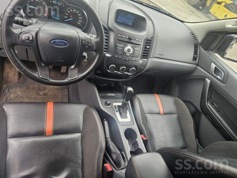 Black Ford Ranger 2015 in Riga, with an engine capacity of 3.20 L and mileage of 263 thousand km for 9680 €, photo 9 on AUTOMOTO.COM.LV