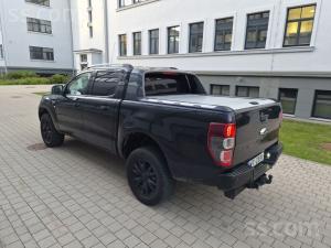 Black Ford Ranger 2015 in Jelgava, with an engine capacity of 3.20 L and mileage of 299 thousand km for 11850 €, photo 5 on AUTOMOTO.COM.LV