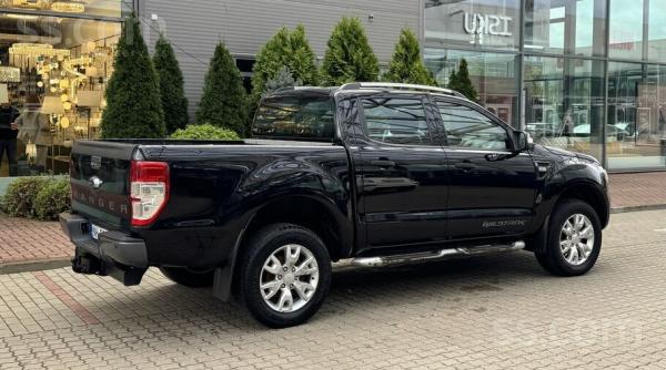 Black Ford Ranger 2015 in Riga, with an engine capacity of 3.20 L and mileage of 210 thousand km for 10500 €, photo 3 on AUTOMOTO.COM.LV