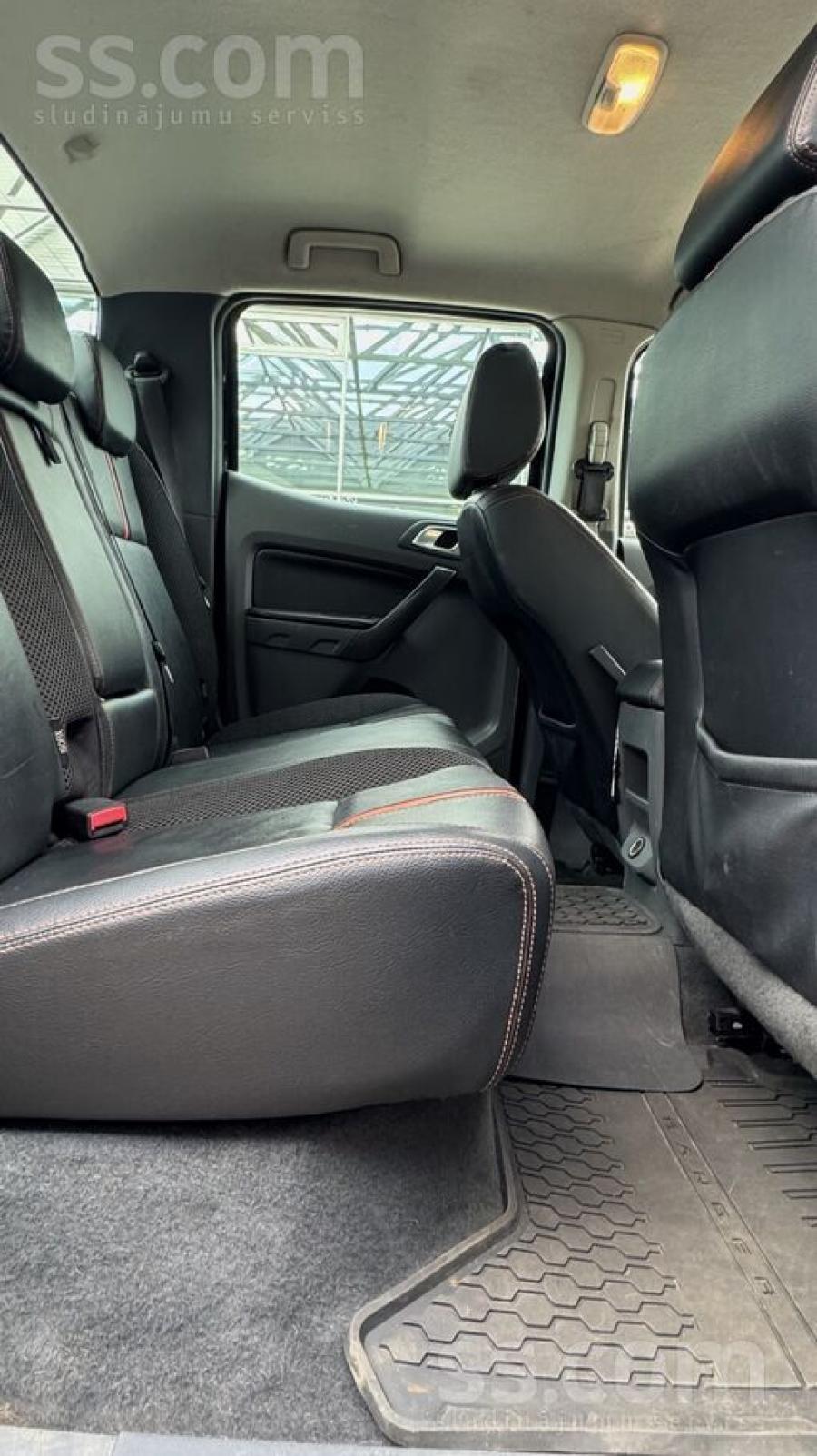 Black Ford Ranger 2015 in Riga, with an engine capacity of 3.20 L and mileage of 210 thousand km for 10500 €, photo 13 on AUTOMOTO.COM.LV