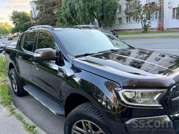 Black Ford Ranger 2017 in Riga, with an engine capacity of 3.20 L and mileage of 230 thousand km for 16650 €, photo 1 on AUTOMOTO.COM.LV