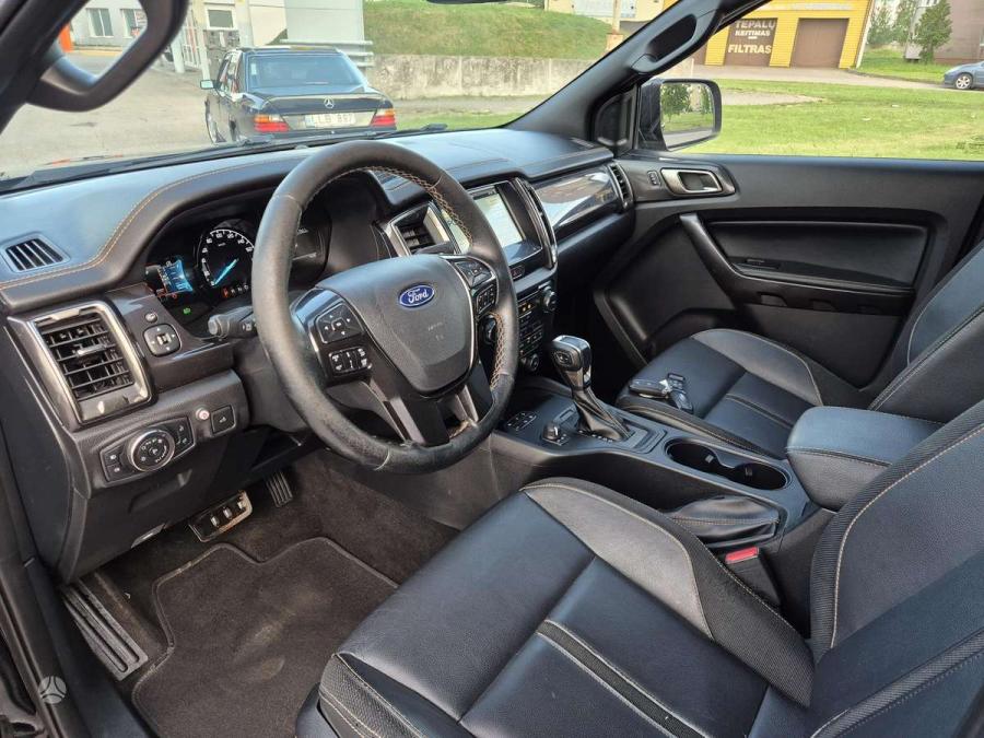 Black Ford Ranger 2019 in Panevezys, with an engine capacity of 2.00 L and mileage of 201 thousand km for 15600 €, photo 12 on AUTOMOTO.COM.LV