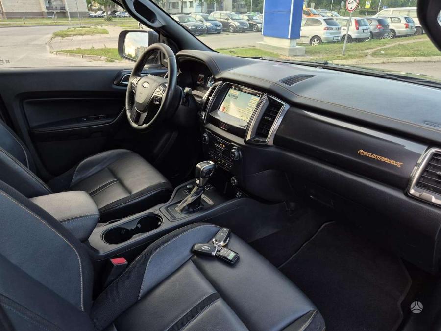 Black Ford Ranger 2019 in Panevezys, with an engine capacity of 2.00 L and mileage of 201 thousand km for 15600 €, photo 13 on AUTOMOTO.COM.LV