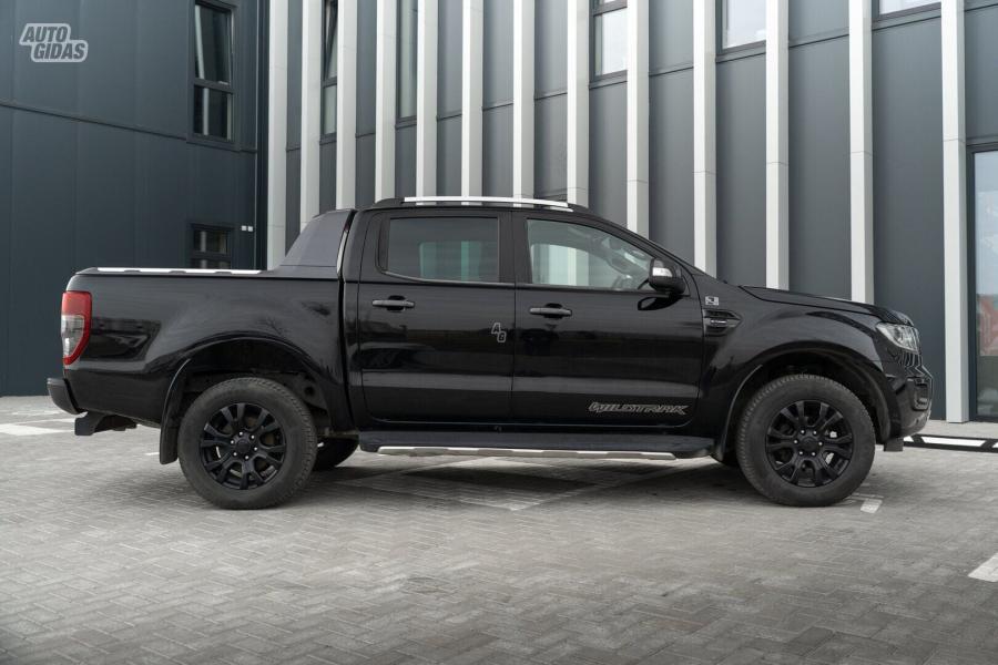 Black Ford Ranger 2022 in Vilnius, with an engine capacity of 2.00 L and mileage of 290 thousand km for 18500 €, photo 7 on AUTOMOTO.COM.LV