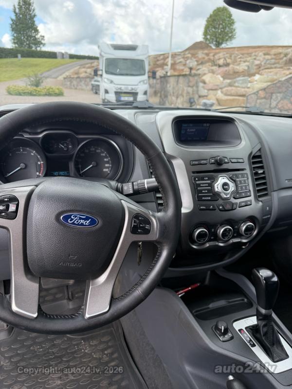 Blue Ford Ranger 2012 in Tallinn, with an engine capacity of 2.20 L and mileage of 402 thousand km for 7800 €, photo 9 on AUTOMOTO.COM.LV