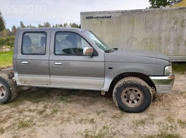 Grey Ford Ranger 2003 in Liepaja, with an engine capacity of 2.50 L and mileage of 300 thousand km for 2950 €, photo 2 on AUTOMOTO.COM.LV