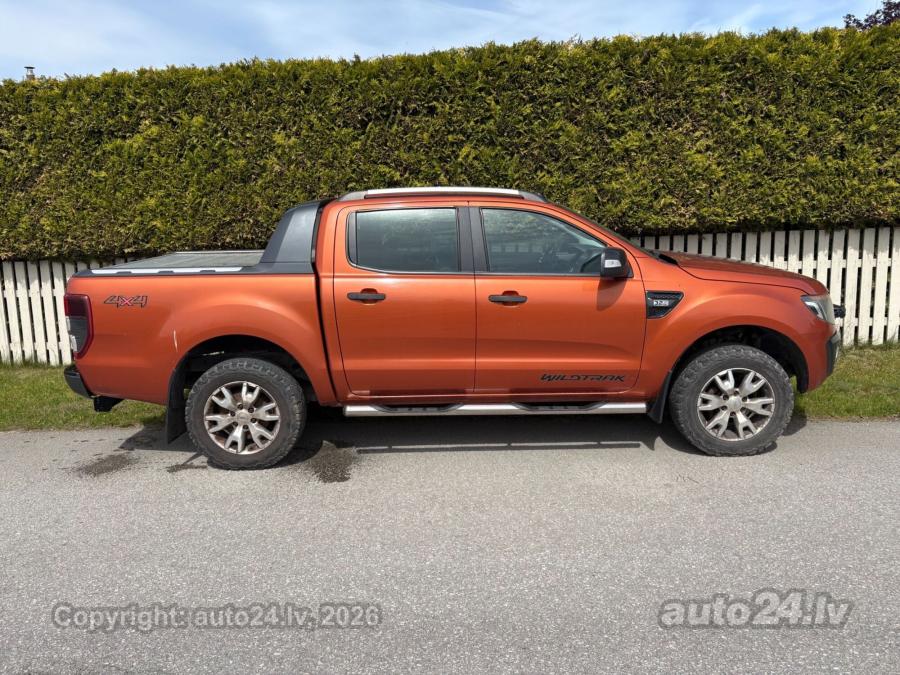 Orange Ford Ranger 2015 in Tallinn, with an engine capacity of 3.20 L and mileage of 264 thousand km for 15900 €, photo 6 on AUTOMOTO.COM.LV