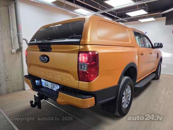 Orange Ford Ranger 2024 in Tallinn, with an engine capacity of 2.00 L and mileage of 58 thousand km for 40900 €, photo 6 on AUTOMOTO.COM.LV