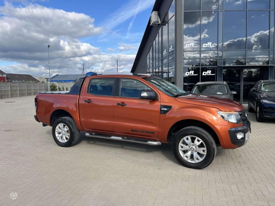 Orange Ford Ranger 2015 in Taurage, with an engine capacity of 3.20 L and mileage of 149 thousand km for 14400 €, photo 6 on AUTOMOTO.COM.LV