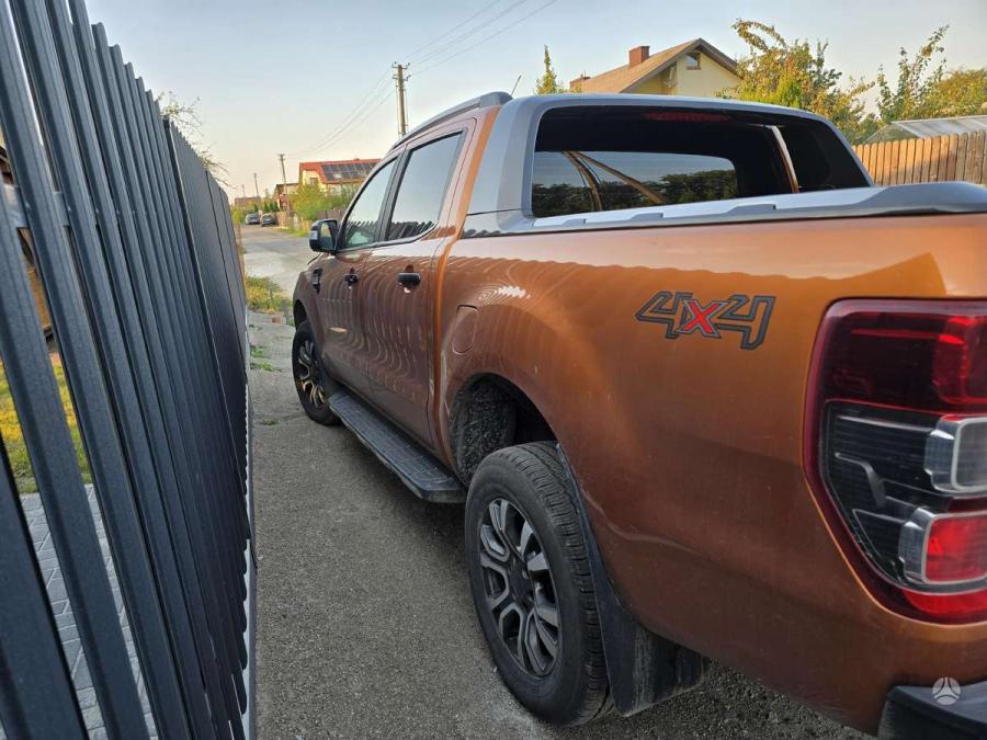 Orange Ford Ranger 2016 in Panevezys, with an engine capacity of 3.20 L and mileage of 160 thousand km for 18000 €, photo 6 on AUTOMOTO.COM.LV