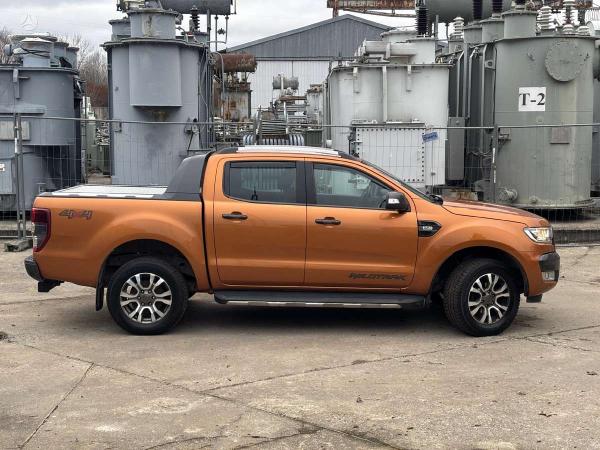Orange Ford Ranger 2017 in Kaunas, with an engine capacity of 3.20 L and mileage of 305 thousand km for 17599 €, photo 2 on AUTOMOTO.COM.LV