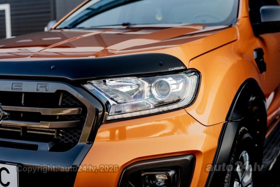 Orange Ford Ranger 2020 in Parnu, with an engine capacity of 2.00 L and mileage of 149 thousand km for 31900 €, photo 11 on AUTOMOTO.COM.LV