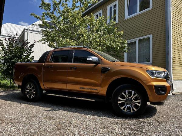 Orange Ford Ranger 2021 in Kaunas, with an engine capacity of 2.00 L and mileage of 130 thousand km for 22500 €, photo 3 on AUTOMOTO.COM.LV