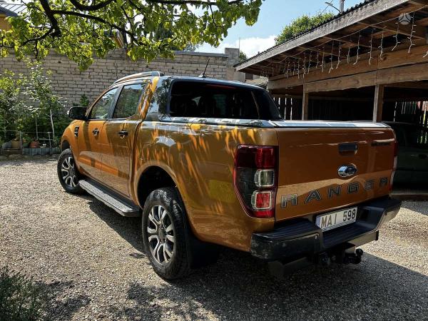 Orange Ford Ranger 2021 in Kaunas, with an engine capacity of 2.00 L and mileage of 130 thousand km for 22500 €, photo 5 on AUTOMOTO.COM.LV