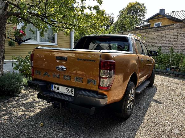 Orange Ford Ranger 2021 in Kaunas, with an engine capacity of 2.00 L and mileage of 130 thousand km for 22500 €, photo 6 on AUTOMOTO.COM.LV