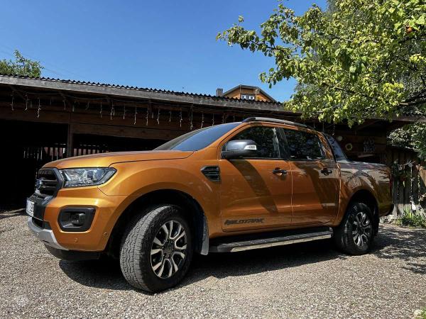 Orange Ford Ranger 2021 in Kaunas, with an engine capacity of 2.00 L and mileage of 130 thousand km for 22500 €, photo 7 on AUTOMOTO.COM.LV