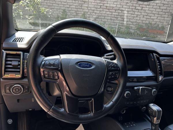 Orange Ford Ranger 2021 in Kaunas, with an engine capacity of 2.00 L and mileage of 130 thousand km for 22500 €, photo 9 on AUTOMOTO.COM.LV