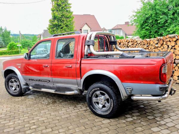 Red Ford Ranger 2006 in Telschi, with an engine capacity of 2.50 L and mileage of 129 thousand km for 3650 €, photo 2 on AUTOMOTO.COM.LV