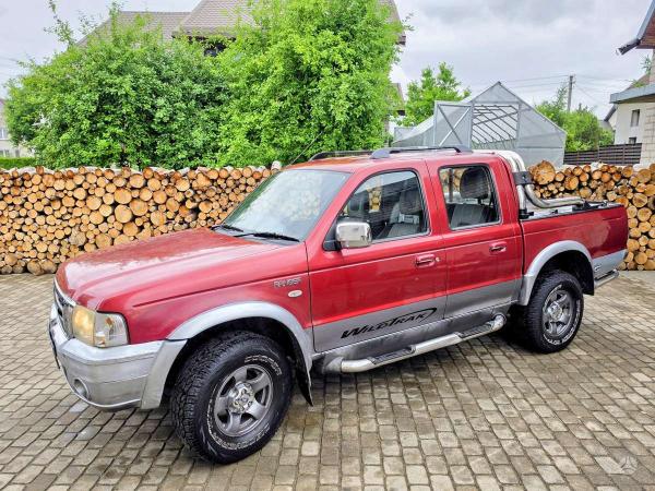 Red Ford Ranger 2006 in Telschi, with an engine capacity of 2.50 L and mileage of 129 thousand km for 3650 €, photo 3 on AUTOMOTO.COM.LV
