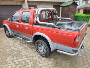 Red Ford Ranger 2006 in Telschi, with an engine capacity of 2.50 L and mileage of 129 thousand km for 3650 €, photo 6 on AUTOMOTO.COM.LV