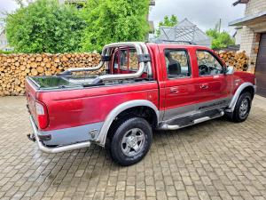 Red Ford Ranger 2006 in Telschi, with an engine capacity of 2.50 L and mileage of 129 thousand km for 3650 €, photo 9 on AUTOMOTO.COM.LV