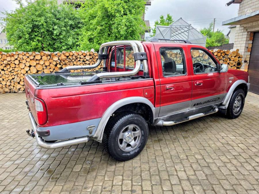 Red Ford Ranger 2006 in Telschi, with an engine capacity of 2.50 L and mileage of 129 thousand km for 3650 €, photo 9 on AUTOMOTO.COM.LV