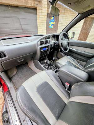 Red Ford Ranger 2006 in Telschi, with an engine capacity of 2.50 L and mileage of 129 thousand km for 3650 €, photo 11 on AUTOMOTO.COM.LV
