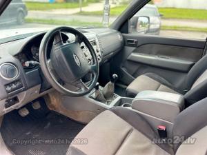 White Ford Ranger 2008 in Tartu, with an engine capacity of 2.50 L and mileage of 400 thousand km for 3500 €, photo 10 on AUTOMOTO.COM.LV