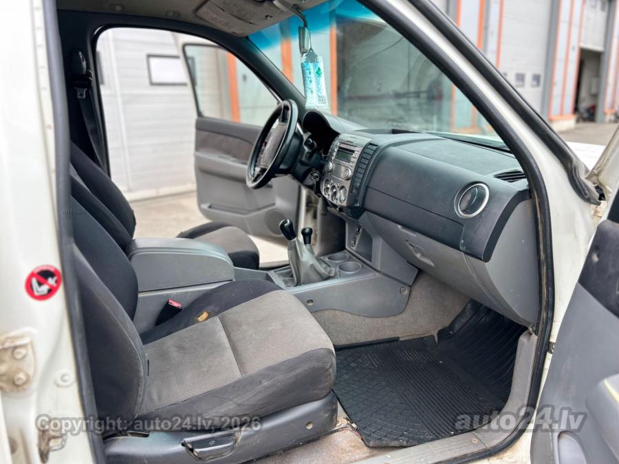 White Ford Ranger 2008 in Tartu, with an engine capacity of 2.50 L and mileage of 400 thousand km for 3500 €, photo 12 on AUTOMOTO.COM.LV