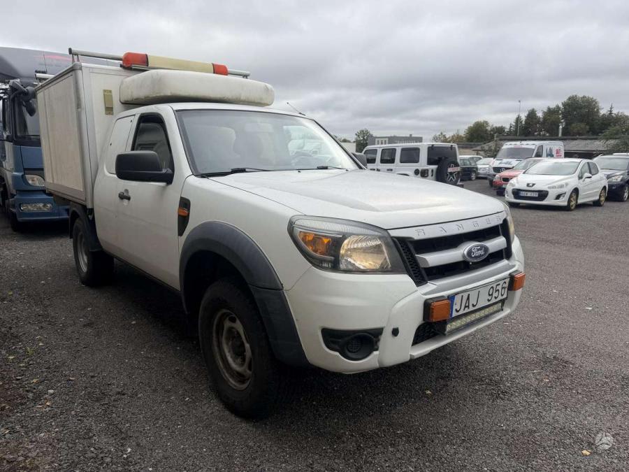 White Ford Ranger 2009 in Kaunas, with an engine capacity of 2.50 L and mileage of 150 thousand km for 3600 €, photo 3 on AUTOMOTO.COM.LV