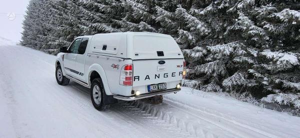 White Ford Ranger 2011 in Radviliskis, with an engine capacity of 2.50 L and mileage of 240 thousand km for 6700 €, photo 3 on AUTOMOTO.COM.LV