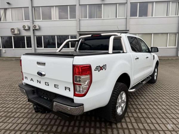 White Ford Ranger 2015 in Marijampole, with an engine capacity of 2.20 L and mileage of 212 thousand km for 12500 €, photo 6 on AUTOMOTO.COM.LV