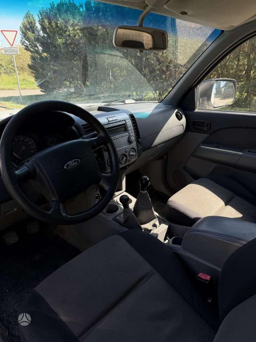 White Ford Ranger 2009 in Vilnius, with an engine capacity of 2.50 L and mileage of 340 thousand km for 4250 €, photo 9 on AUTOMOTO.COM.LV