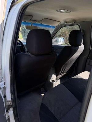 White Ford Ranger 2009 in Vilnius, with an engine capacity of 2.50 L and mileage of 340 thousand km for 4250 €, photo 11 on AUTOMOTO.COM.LV