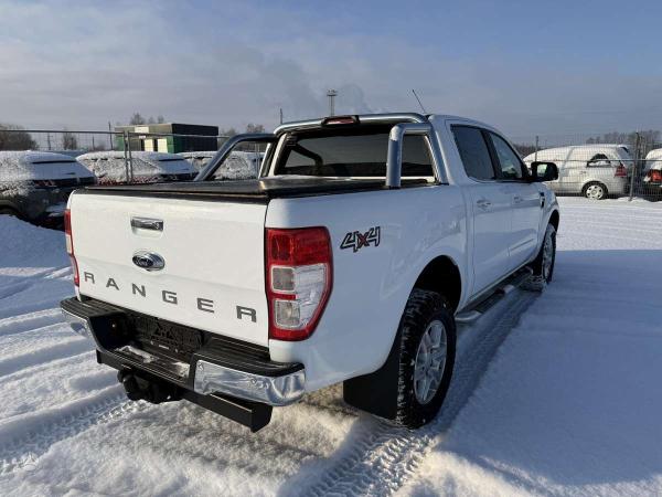 White Ford Ranger 2015 in Marijampole, with an engine capacity of 2.20 L and mileage of 212 thousand km for 11800 €, photo 8 on AUTOMOTO.COM.LV